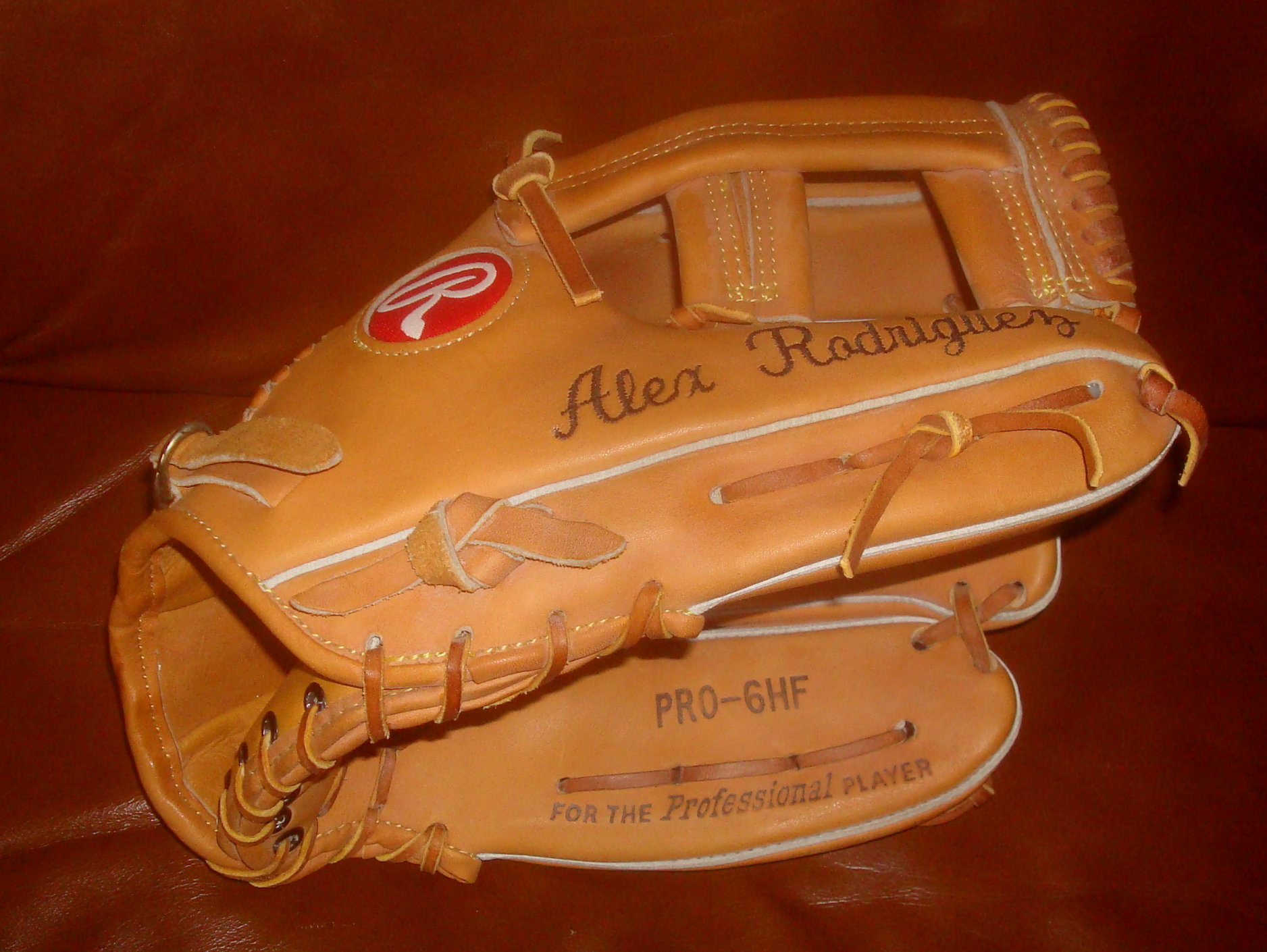 Vintage baseball Gloves; Old, new, and used mitts, bats